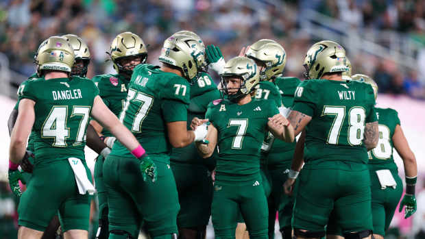 Cure Bowl Takeaways: Old Dominion Runs Past USF - College Football News ...